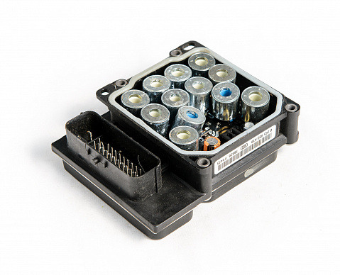 What is an ABS/EBCM module?